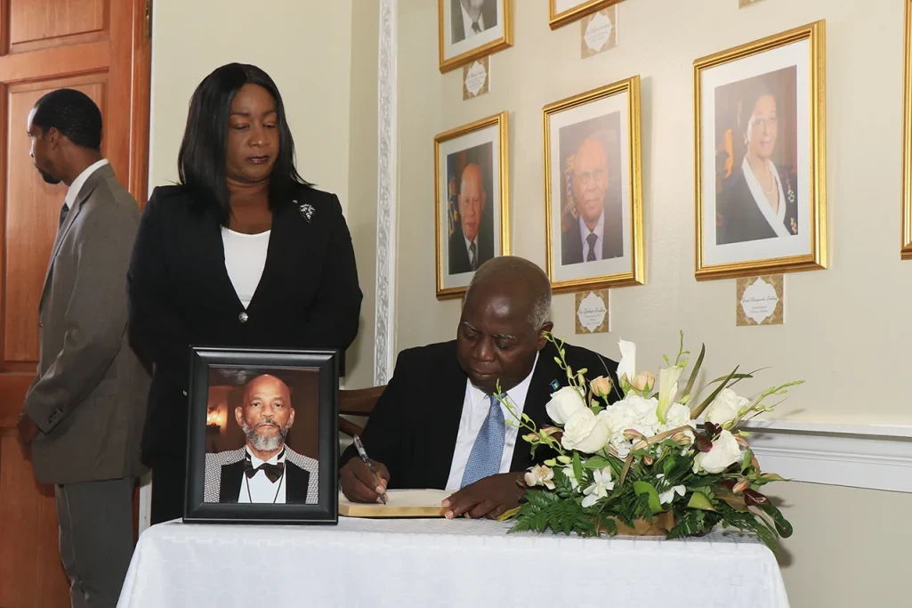 Prime Minister Philip Davis pays respects to the late Rodney