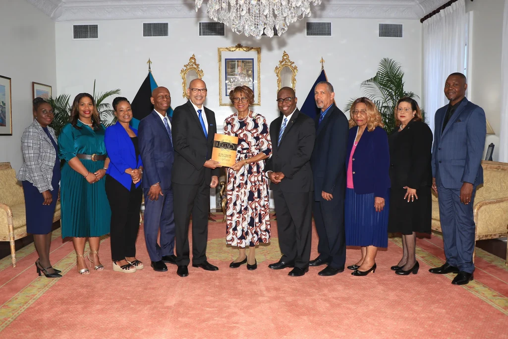 Bahamas Faith Ministries International presents a book to th