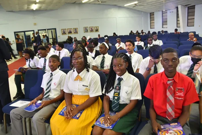 Students of Queen’s College and Samuel Guy Pinder School Tak