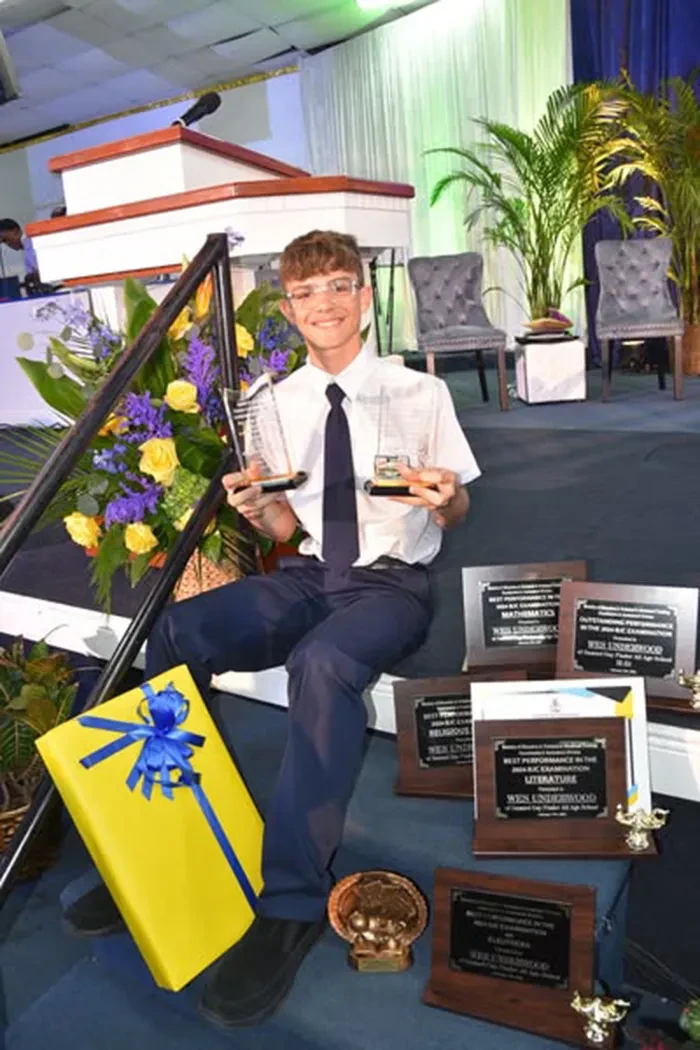 Students of Queen’s College and Samuel Guy Pinder School Tak