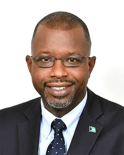 The Hon. Wayne R. Munroe, K.C